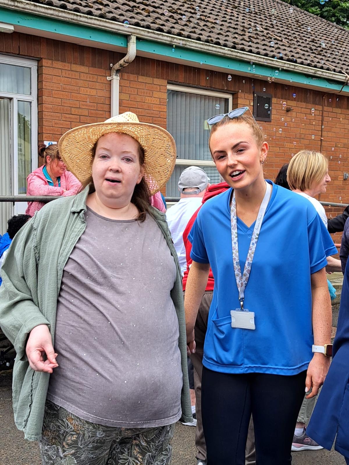 Benbradagh Service User And Staff Enjoying The Bubble Bike (1) | Western Health & Social Care Trust